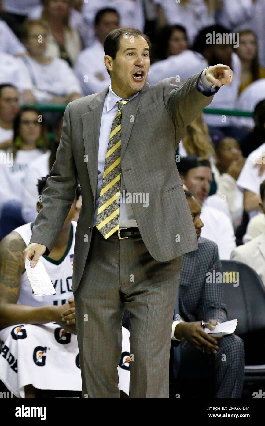 Baylor head coach Scott Drew calls a play front he bench against Kansas ...