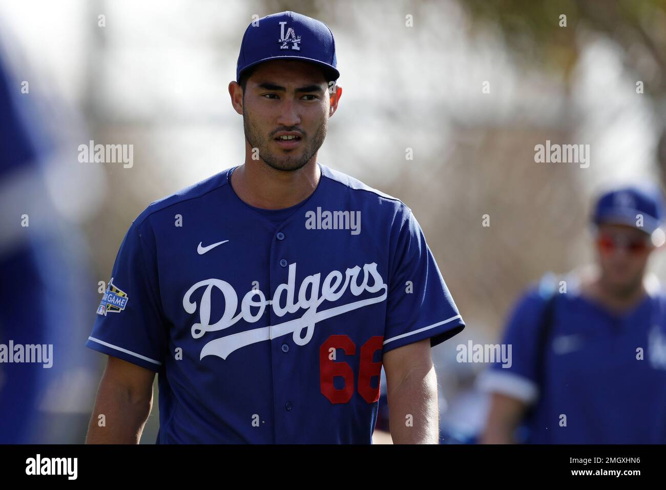 Los Angeles Dodgers pitcher Mitchell White looks on during spring ...