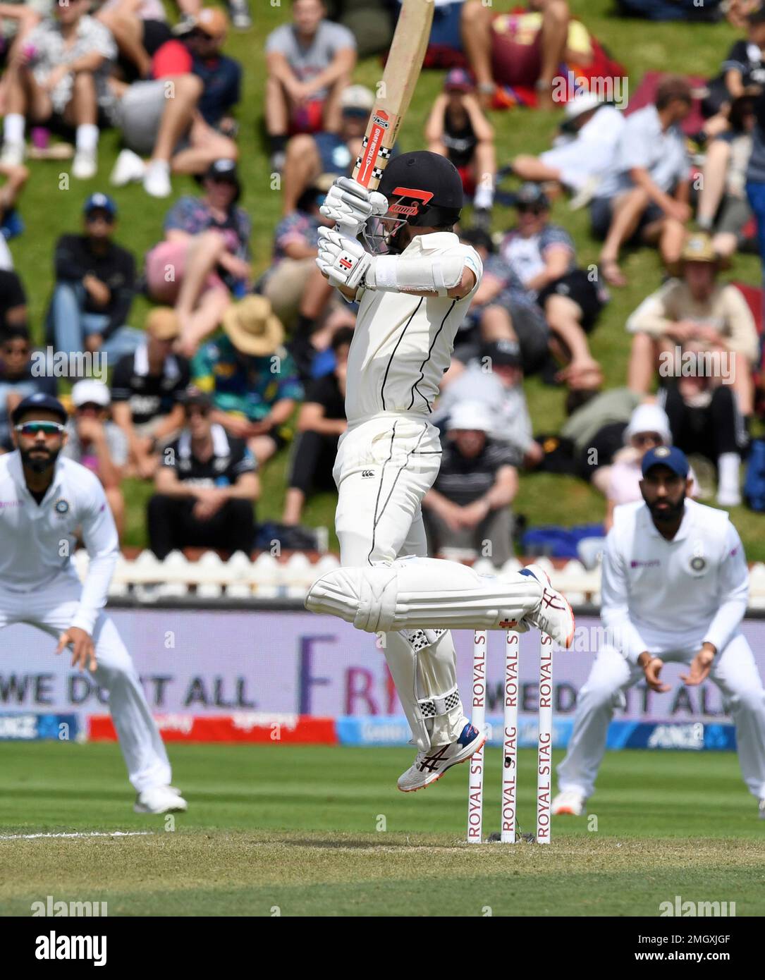 New Zealand's Kane Williamson bats off the ground against India during ...
