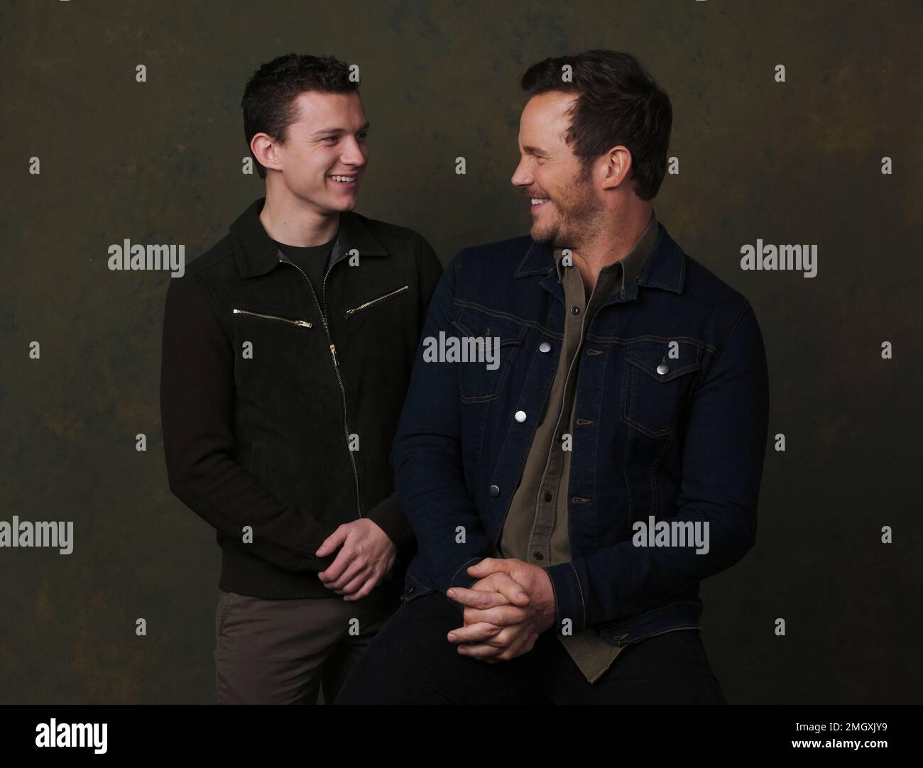 Tom Holland, left, and Chris Pratt, voice cast members in the animated ...