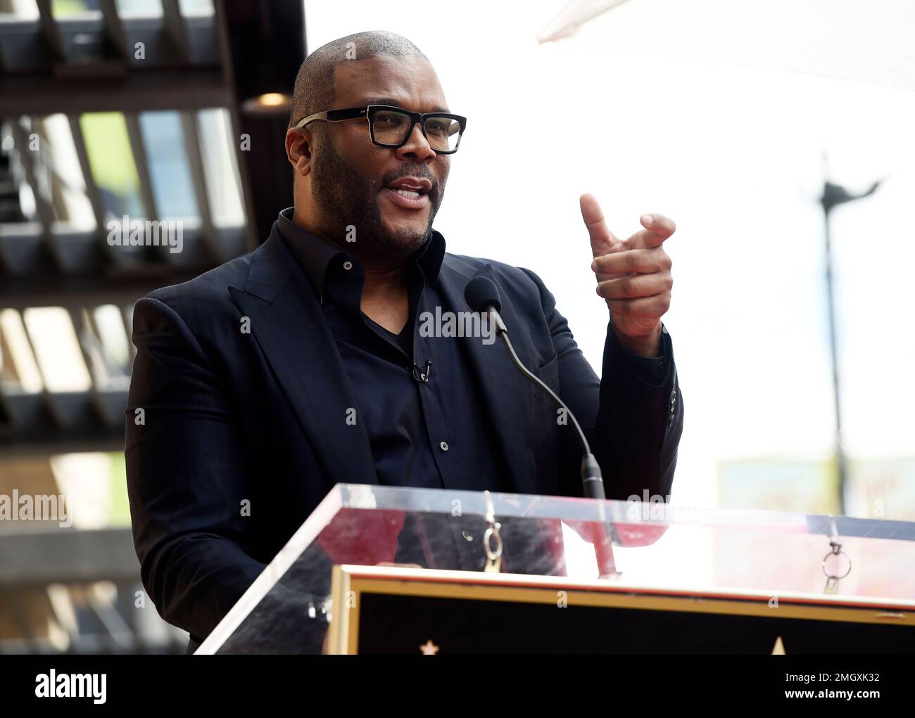 Guest speaker Tyler Perry addresses the crowd during a ceremony to ...