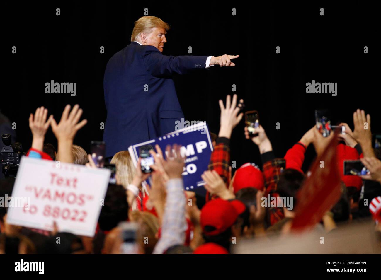 President Donald Trump points as he walks offstage after speaking at a ...
