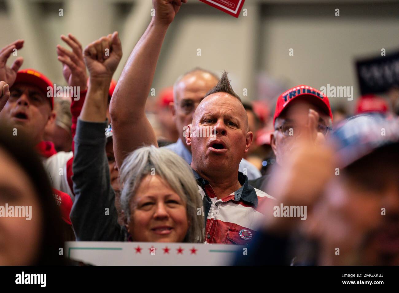 Supporters of President Donald Trump cheer as he arrives to speak to a ...