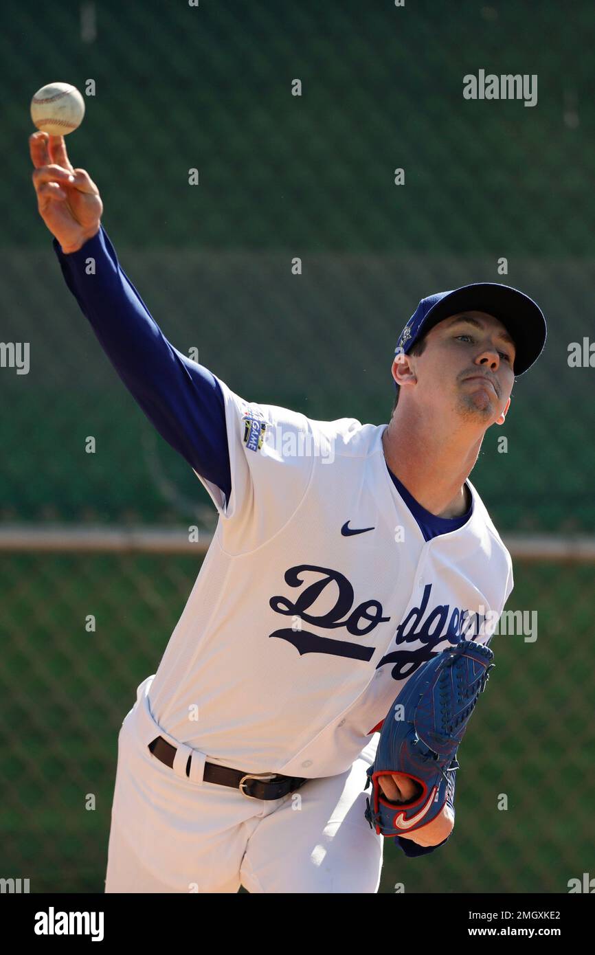 Los Angeles Dodgers pitcher Walker Buehler throws during spring ...