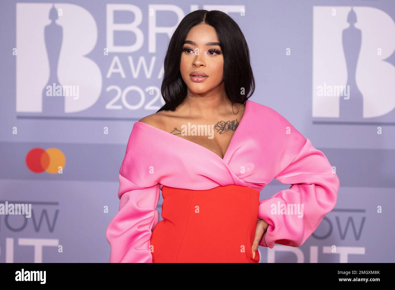 Yinka Bokinni poses for photographers upon arrival at Brit Awards 2020 ...