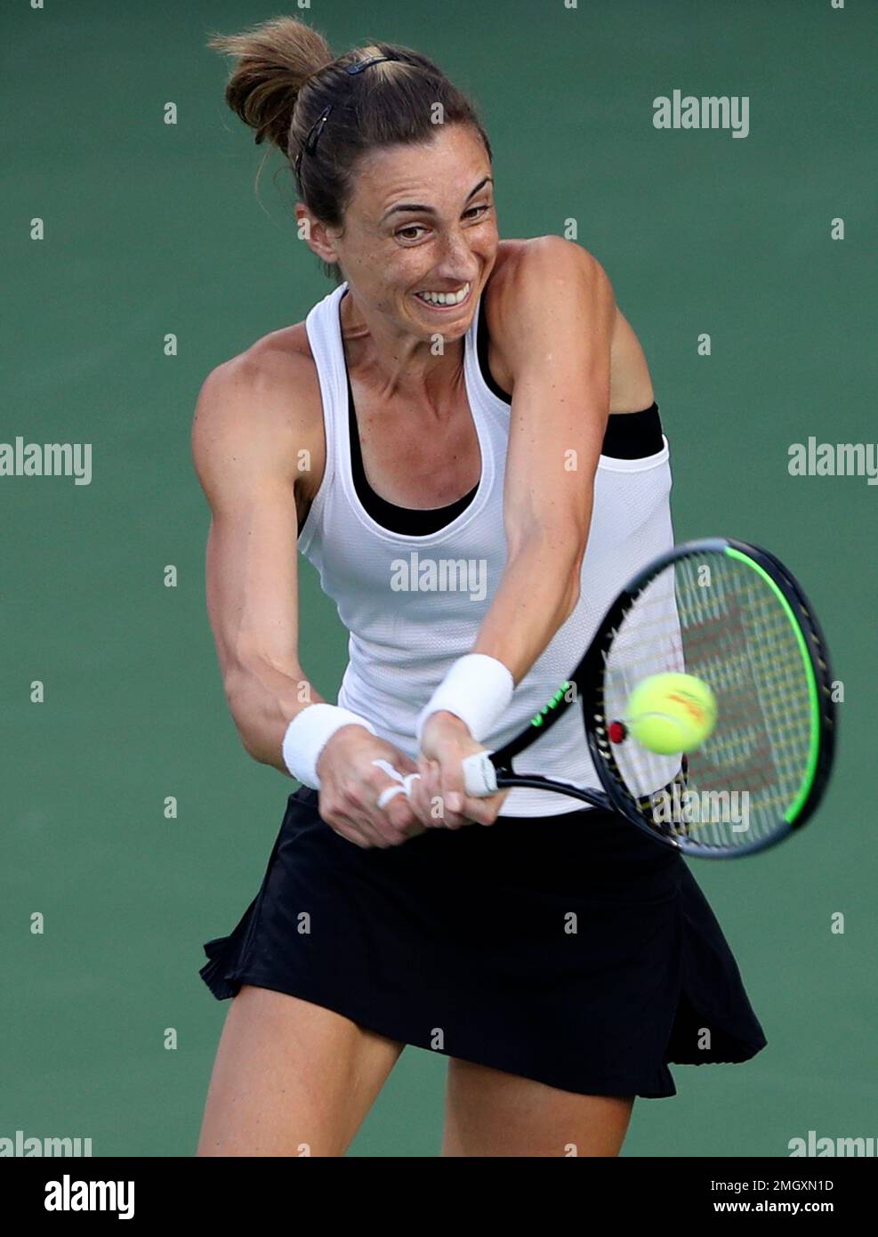Croatia's Petra Martic returns the ball to Kazakhstan's Elena Rybakina ...