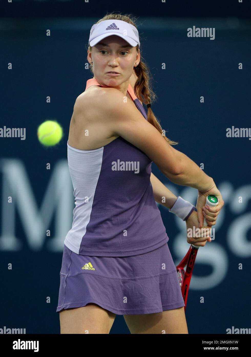 Kazakhstan's Elena Rybakina returns the ball to Croatia's Petra Martic ...