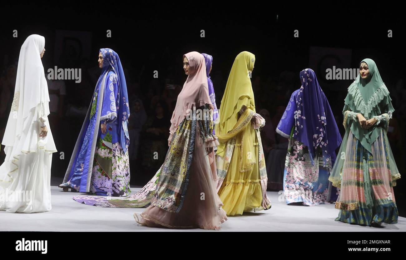 Models display Muslim cloth during the Muslim Fashion Festival in ...