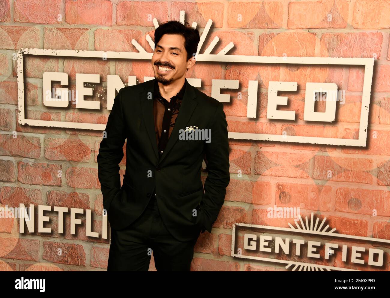 Carlos Santos, a cast member in the Netflix series "Gentefied," poses ...