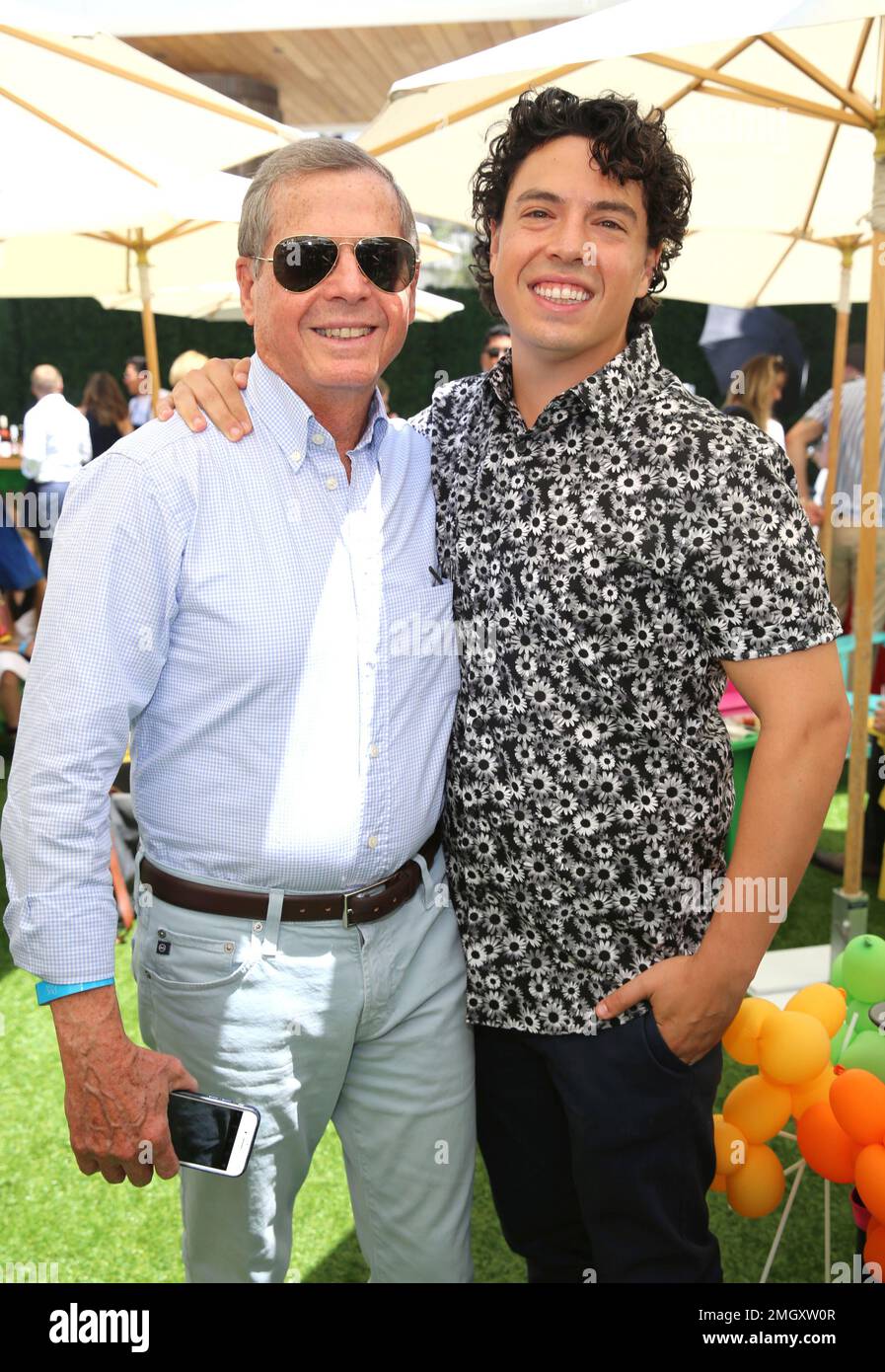 Jon Bass and his father seen at the premiere of "Dog Days" at the ...