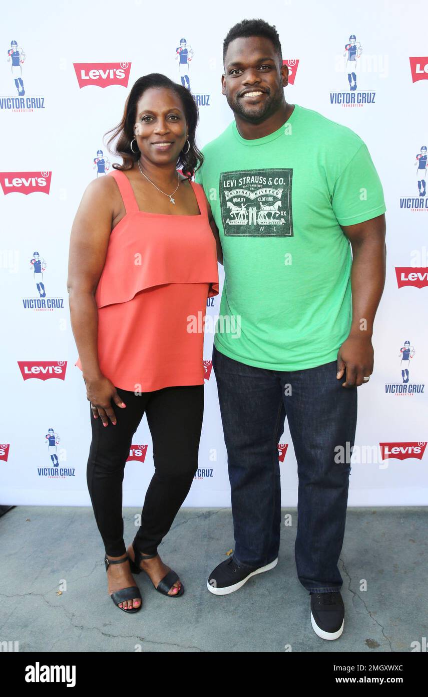 Sandra Atkins, left, and Geno Atkins are seen at Levi's x Victor Cruz ...