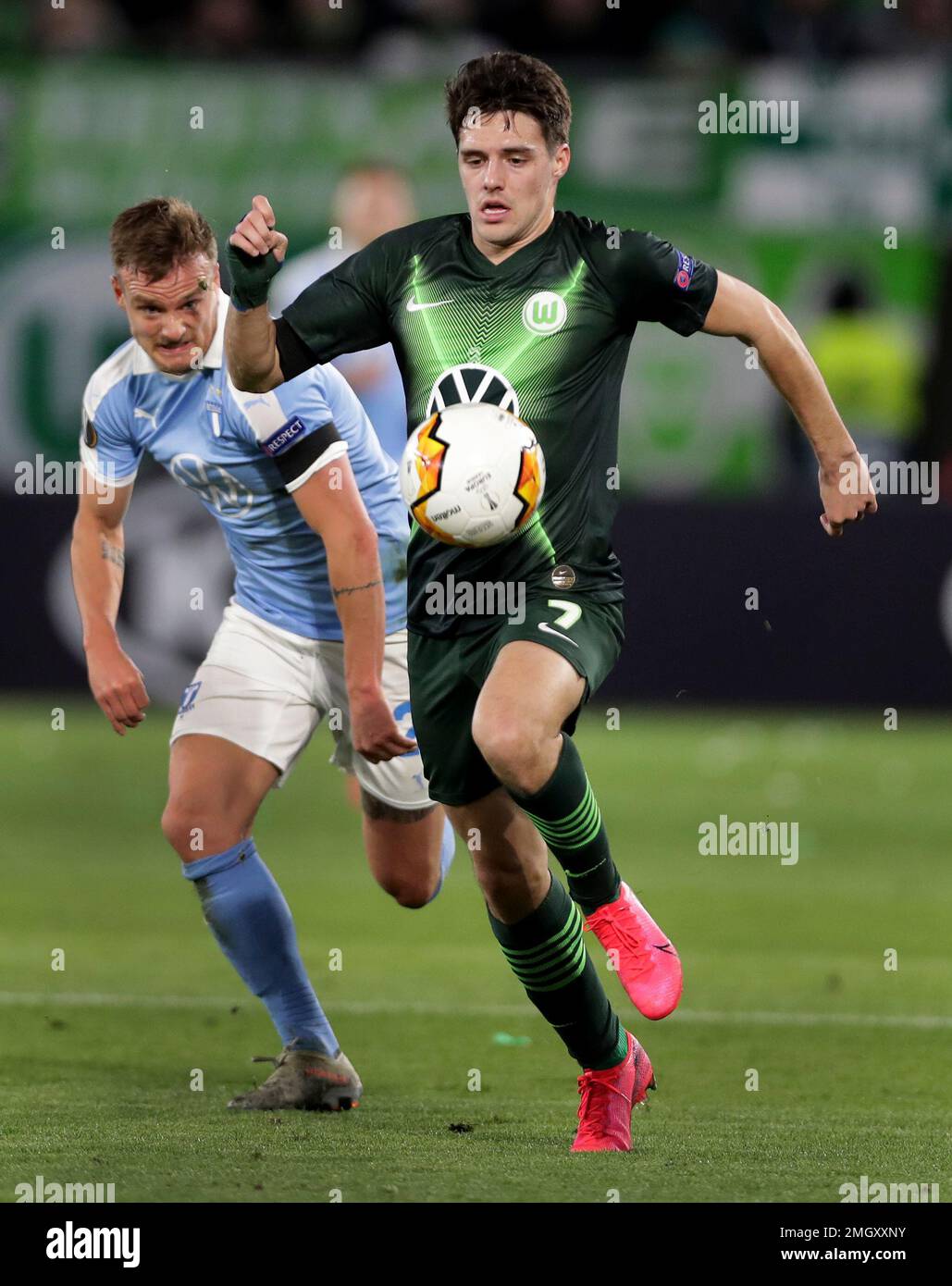 Wolfsburg's Josip Brekalo, front, and Malmo's Eric Larsson , rear ...