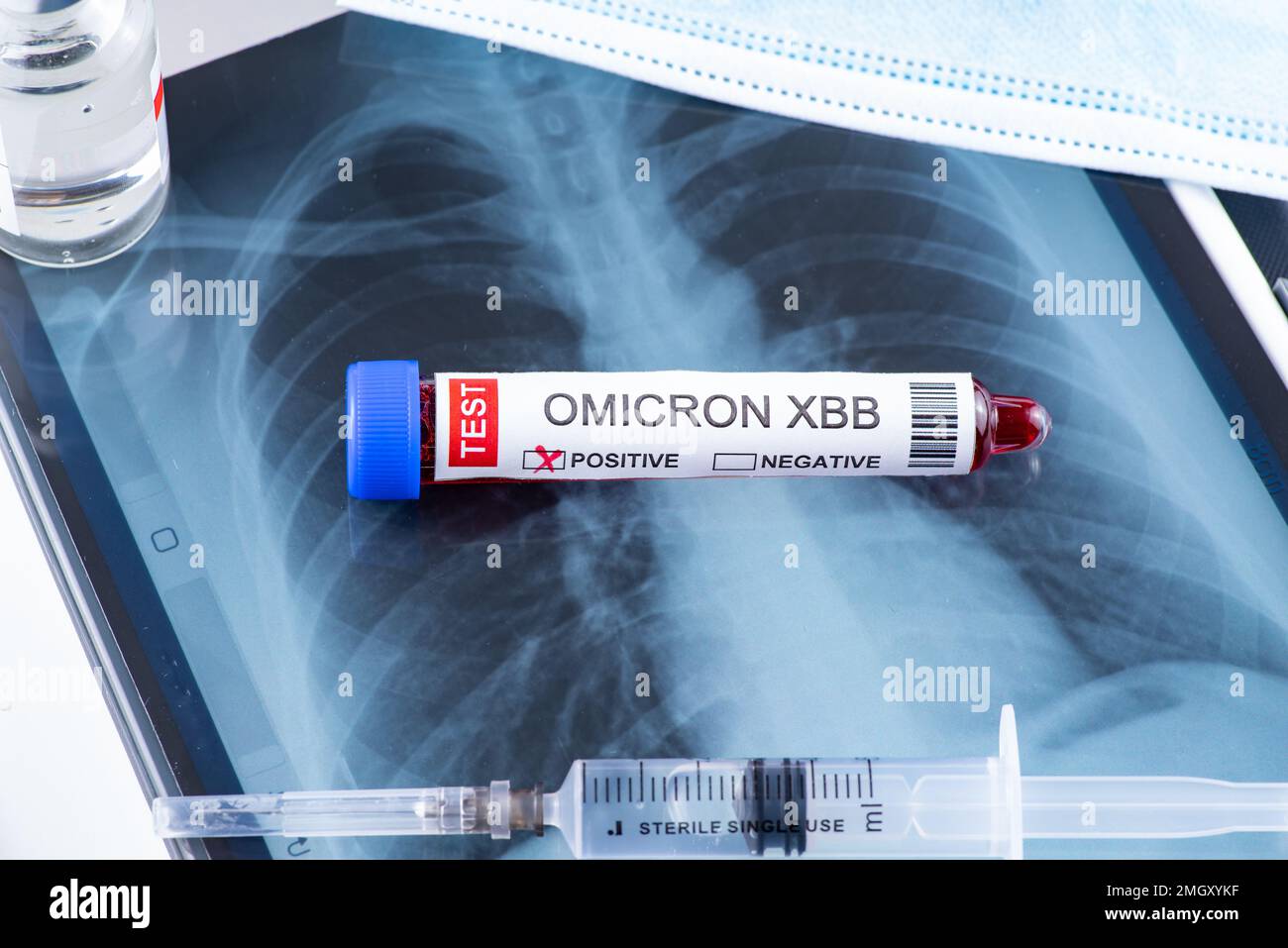 Test tube labelled "OMICRON XBB variant test positive Stock Photo - Alamy