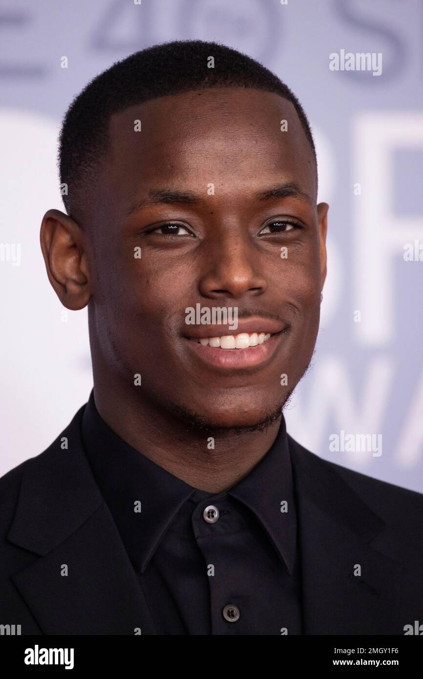 Micheal Ward poses for photographers upon arrival at Brit Awards 2020 ...