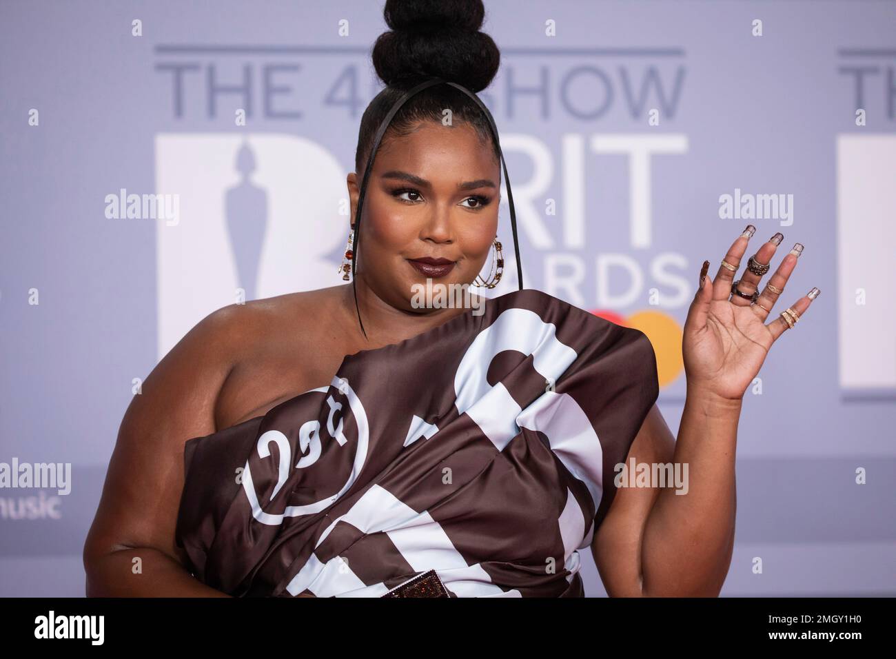 Lizzo poses for photographers upon arrival at Brit Awards 2020 in ...
