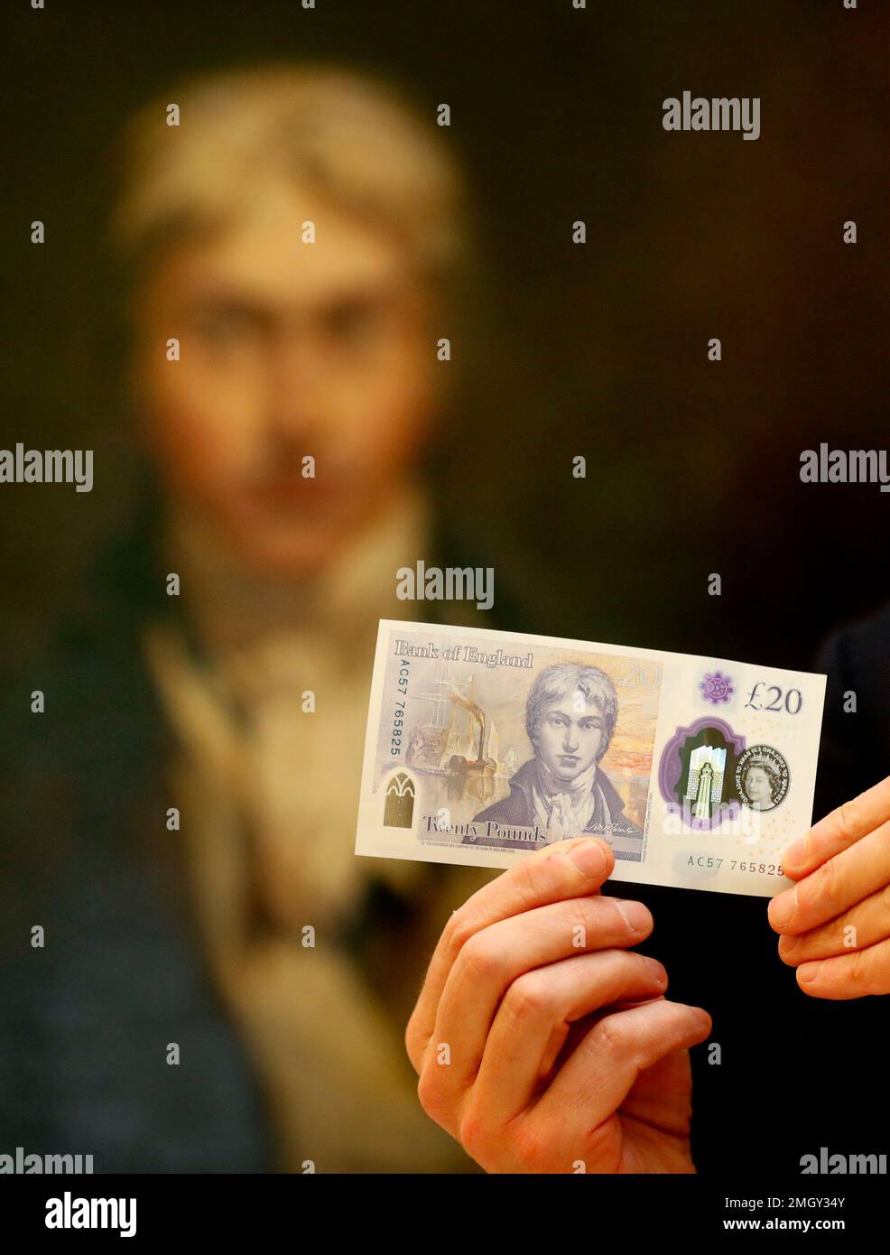 The new 20 pound note is displayed in front of a self portrait of JMW ...