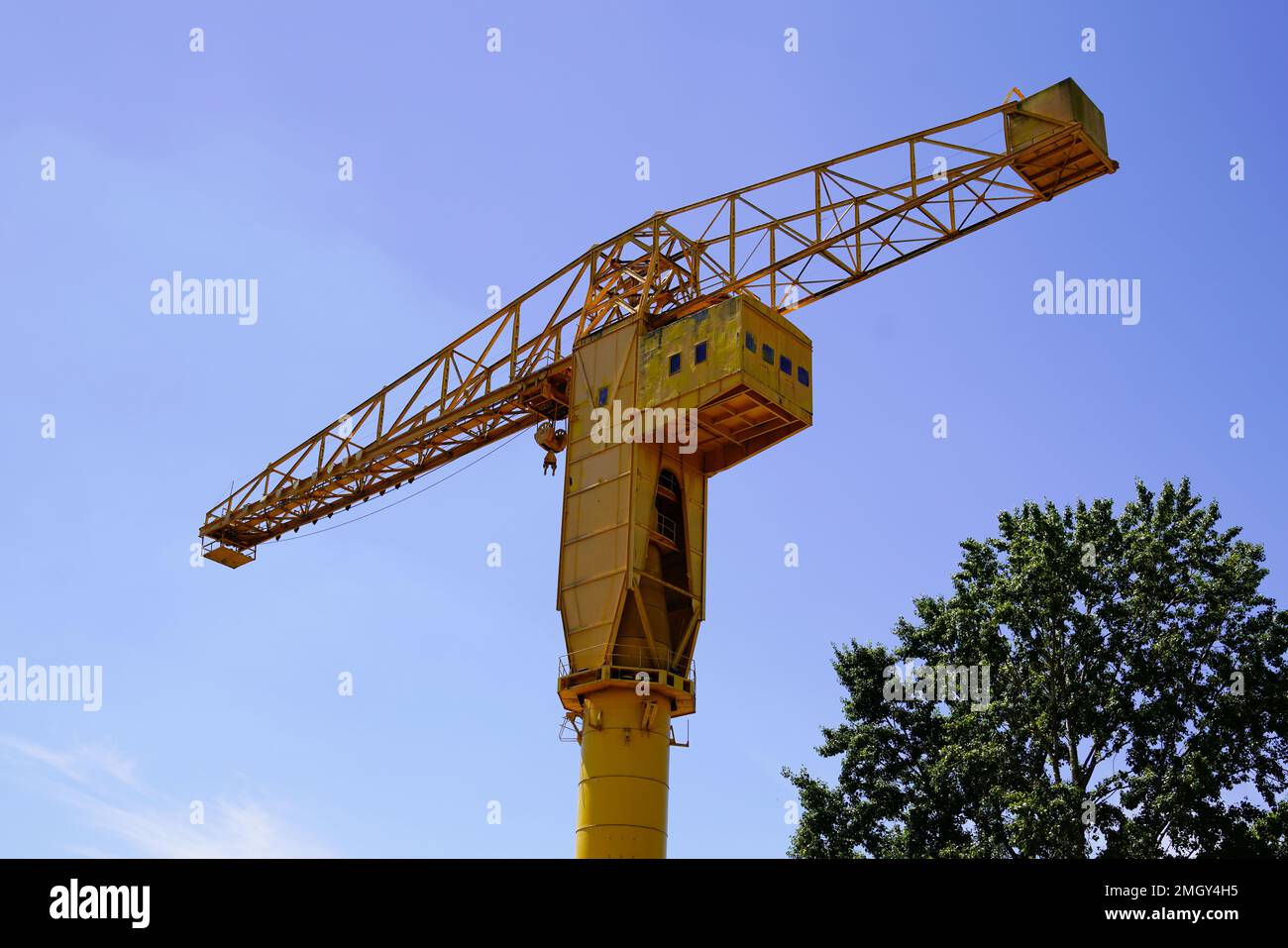 Nantes yellow crain at the tourist docks in france Stock Photo - Alamy