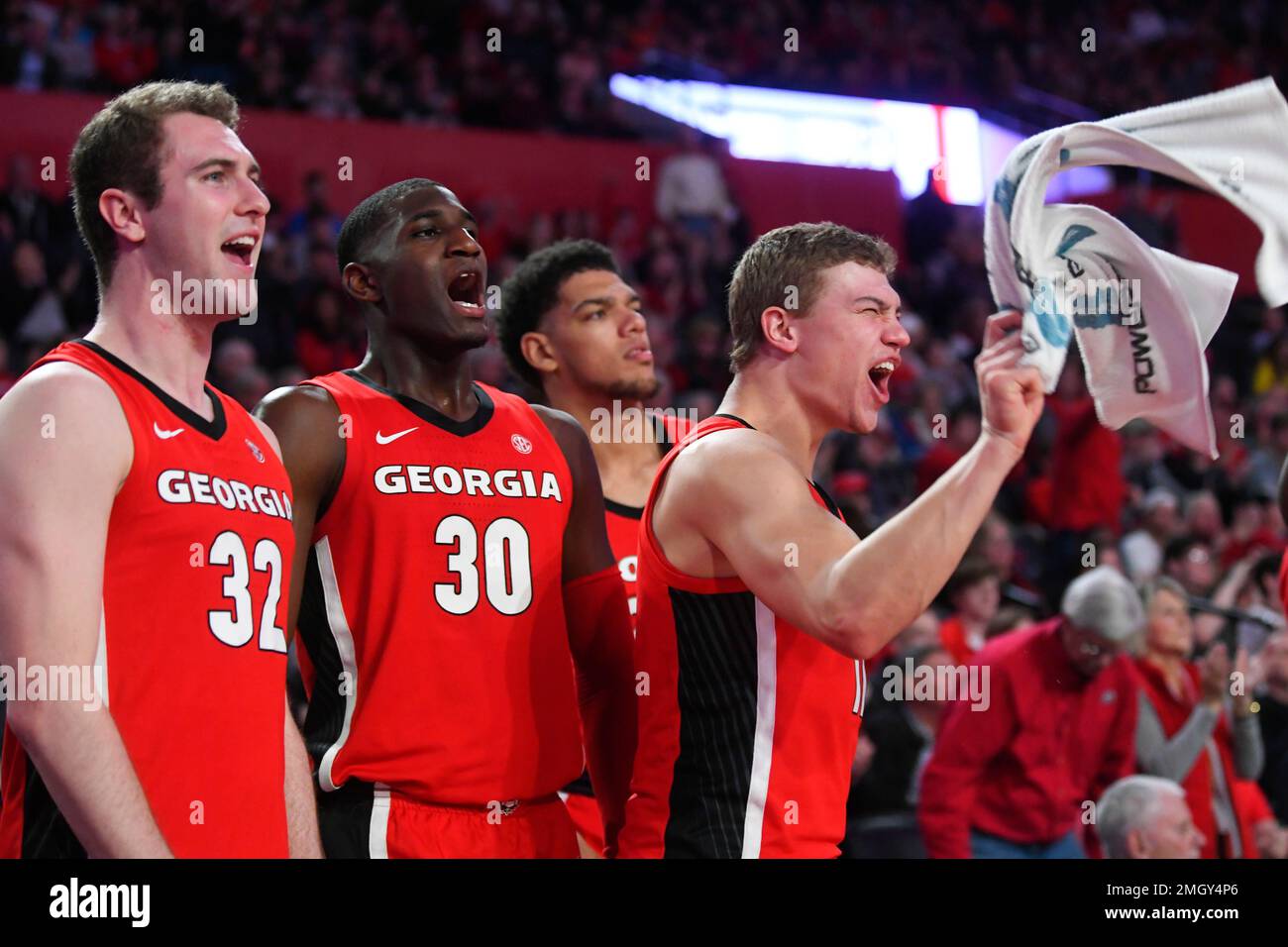 Georgia guard Stan Turnier (32), forward Mike Peake (30) and guard ...