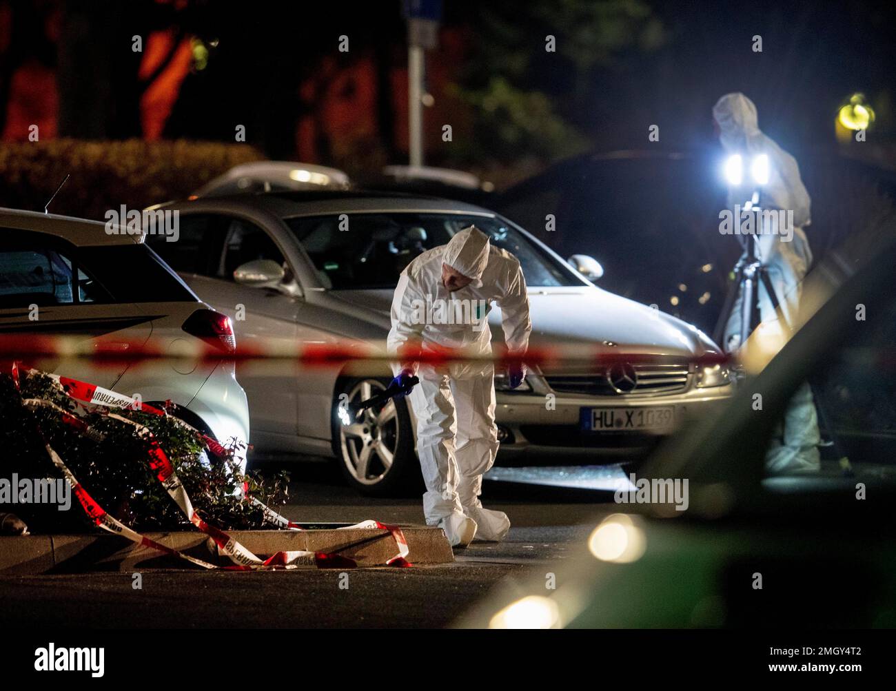 Forensics investigate at the scene after a shooting in central Hanau ...