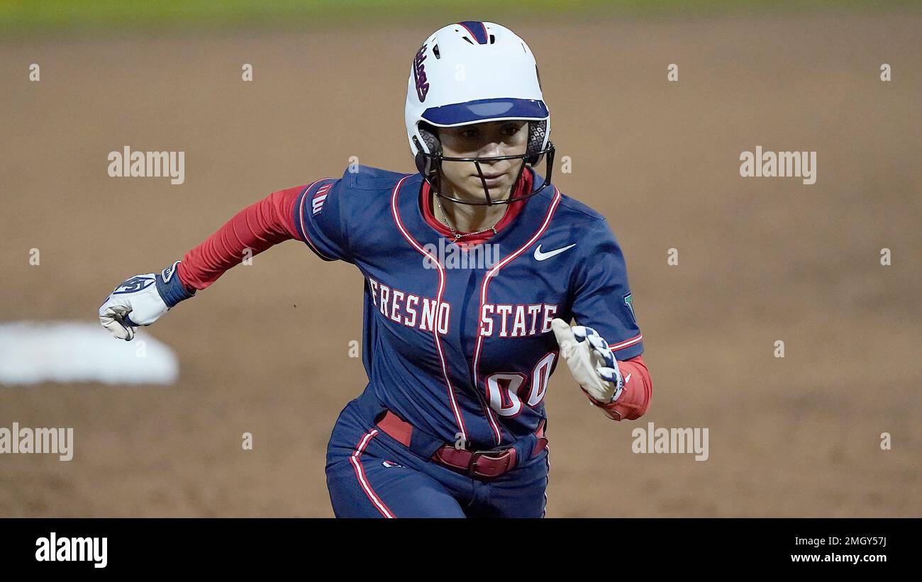 Fresno State's Aaliyah Cuevas-Iñiguez (00) runs to third base against ...