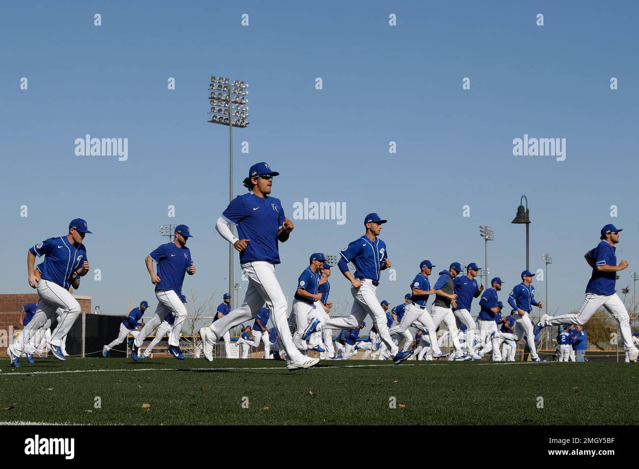 Kansas City Royals players run during spring training baseball practice ...