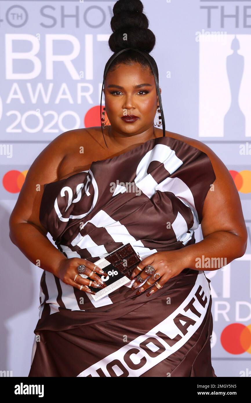 Lizzo poses for photographers upon arrival at the Brit Awards 2020 in ...