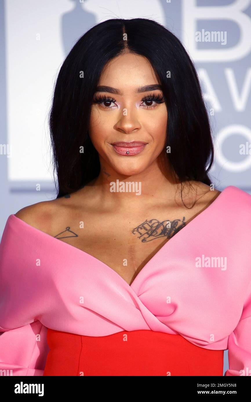 Yinka Bokinni poses for photographers upon arrival at the Brit Awards ...