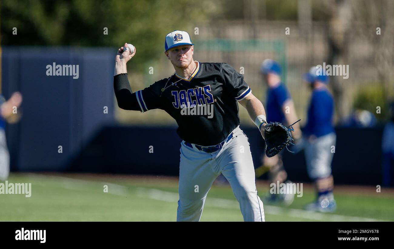 South Dakota State senior Josh Falk throws during warmups before an ...