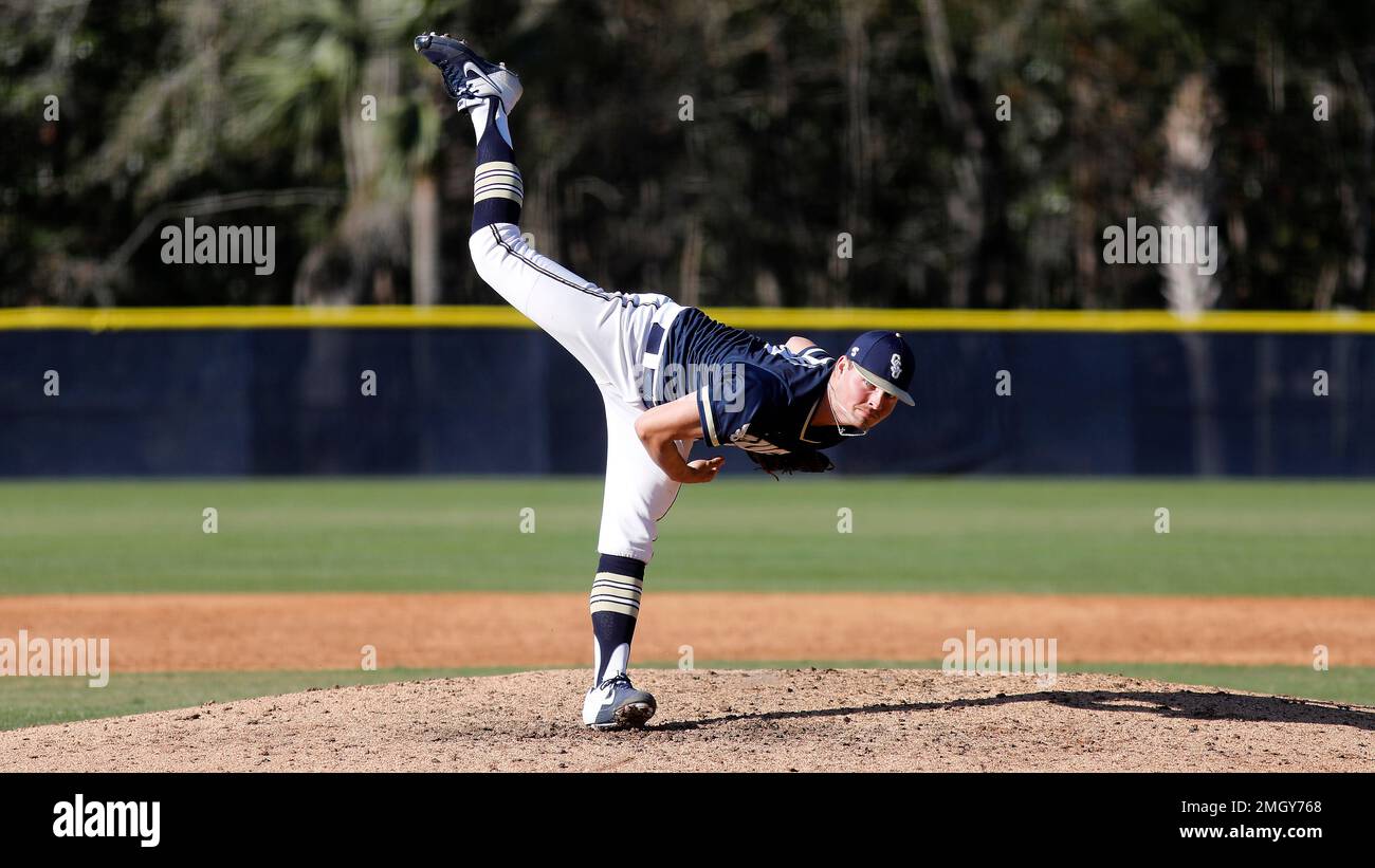 Charleston Southern's Hunter Illing pitches against Rider in an NCAA ...