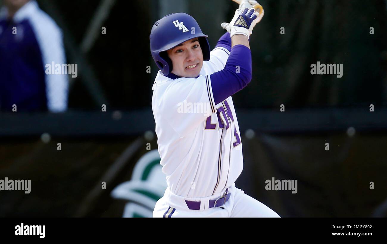 North Alabama catcher Gerardo Miranda (23) hits a single during an NCAA ...