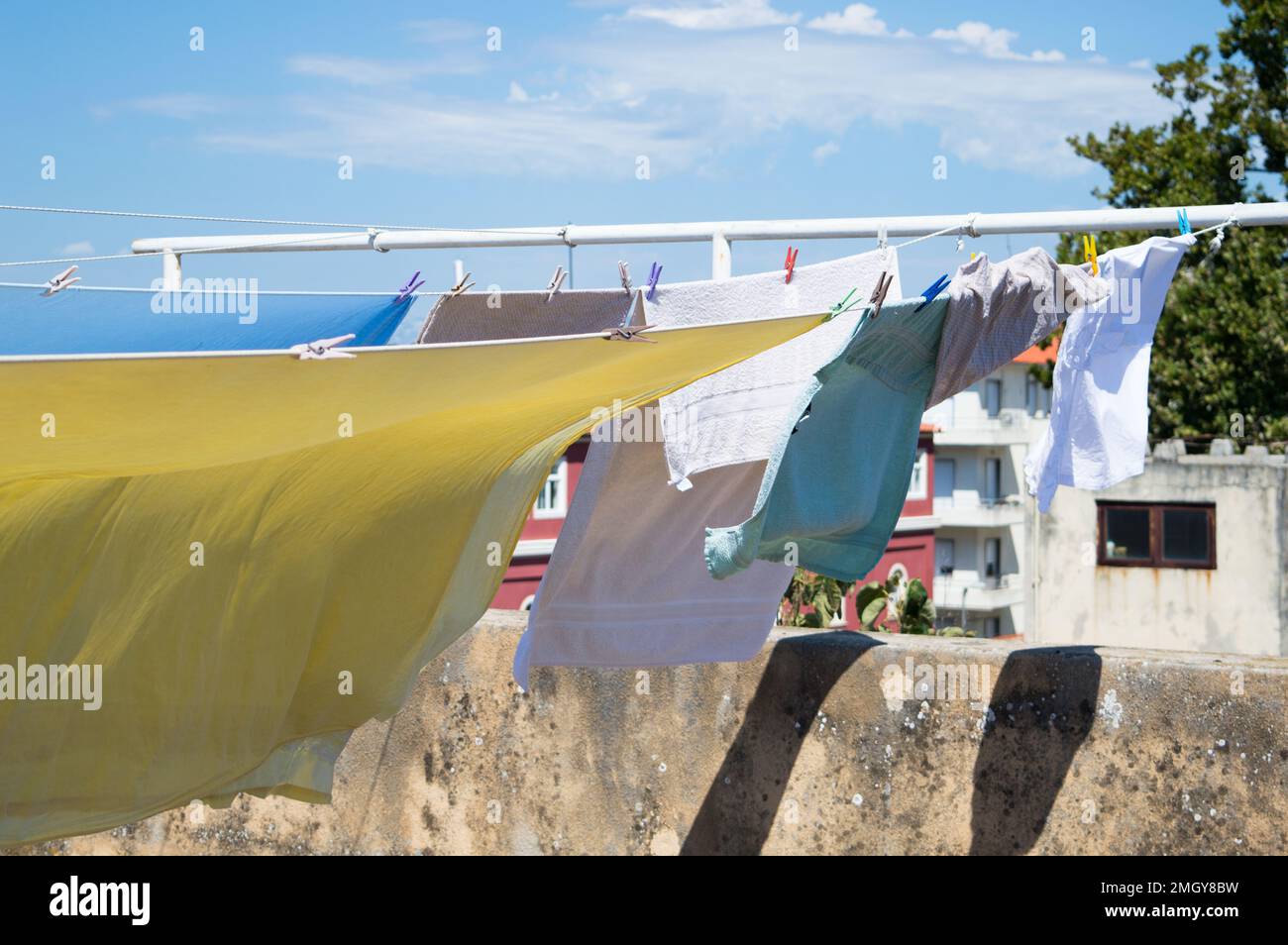 Laundry hanging on the clothes line Stock Photo - Alamy