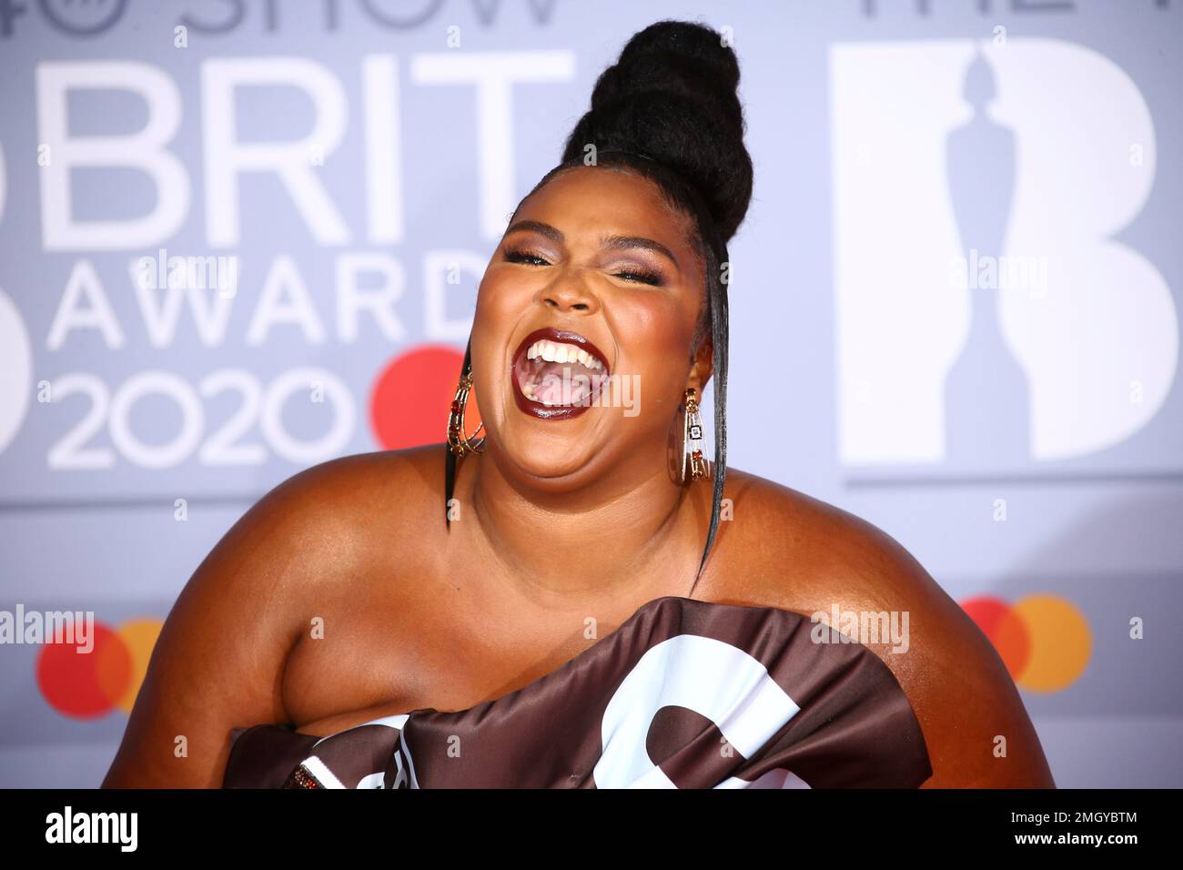 Singer Lizzo poses for photographers upon arrival at the Brit Awards ...