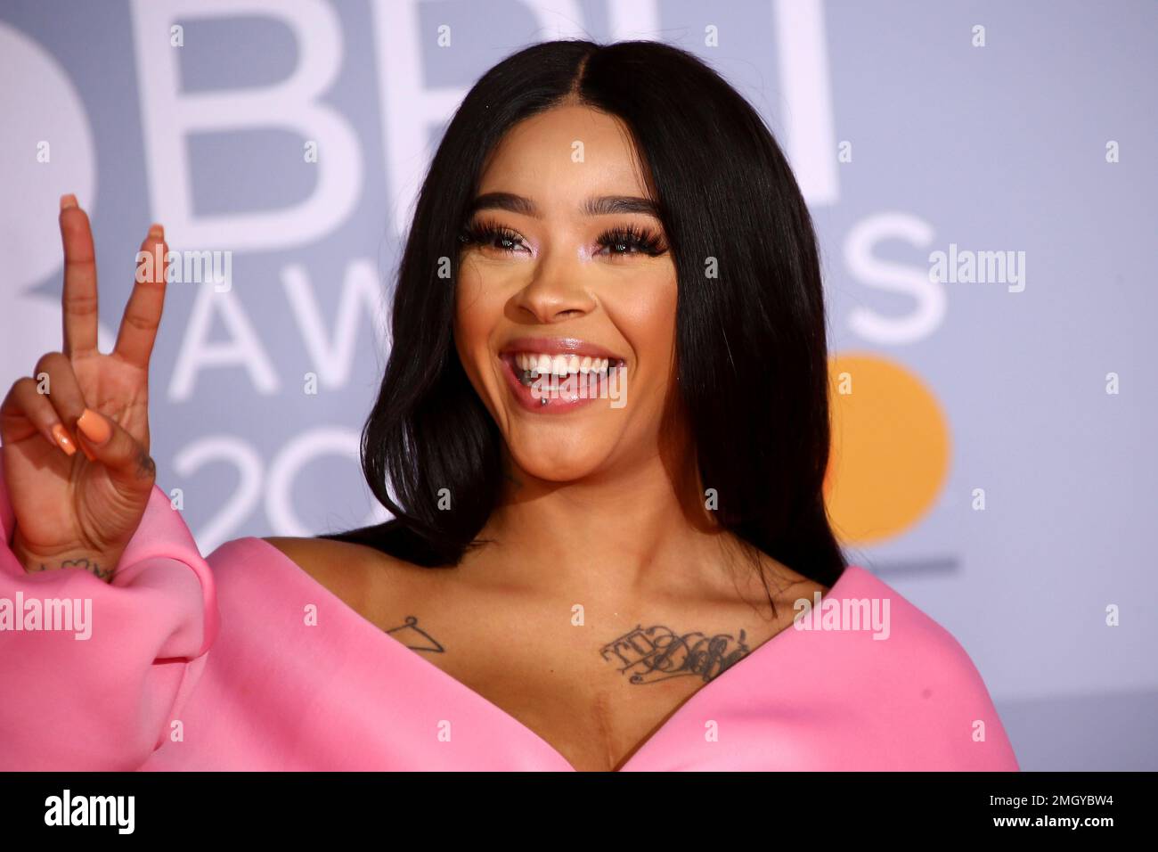Yinka Bokinni poses for photographers upon arrival at the Brit Awards ...