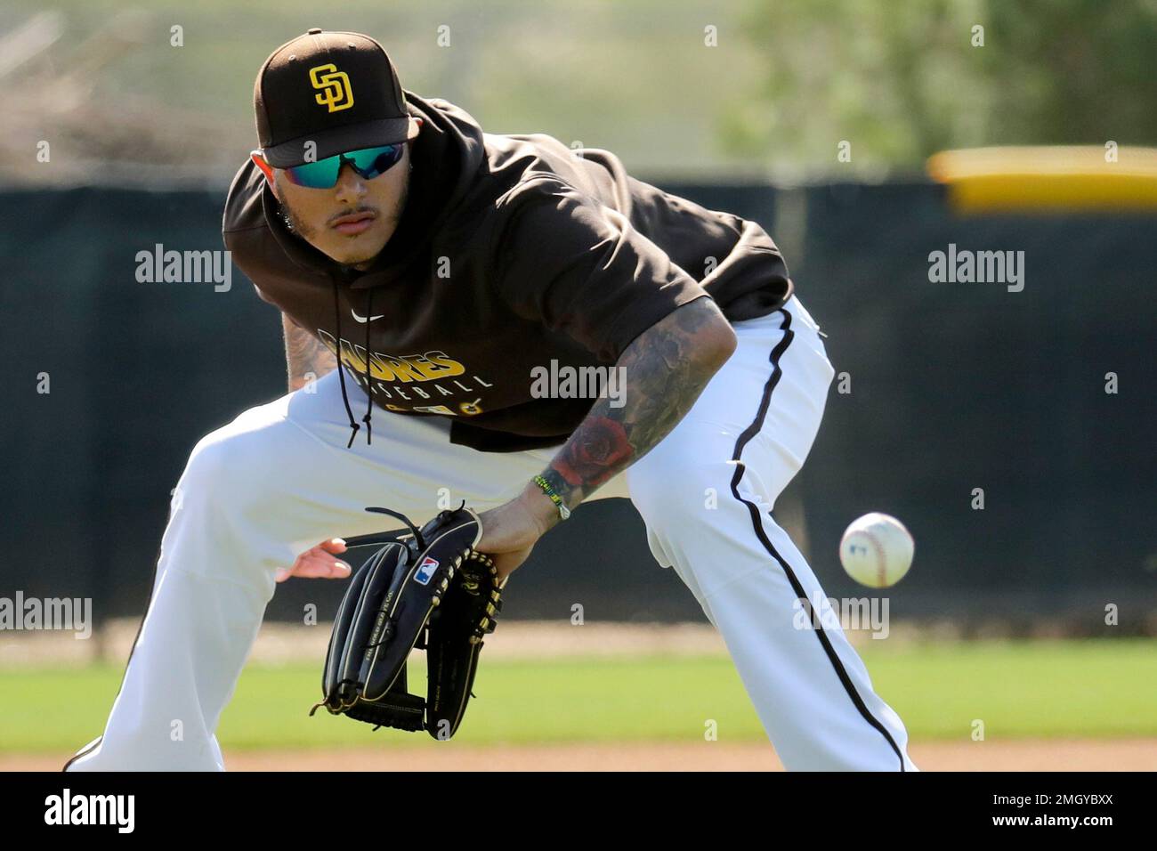 San Diego Padres' Manny Machado fields a ball during spring training ...