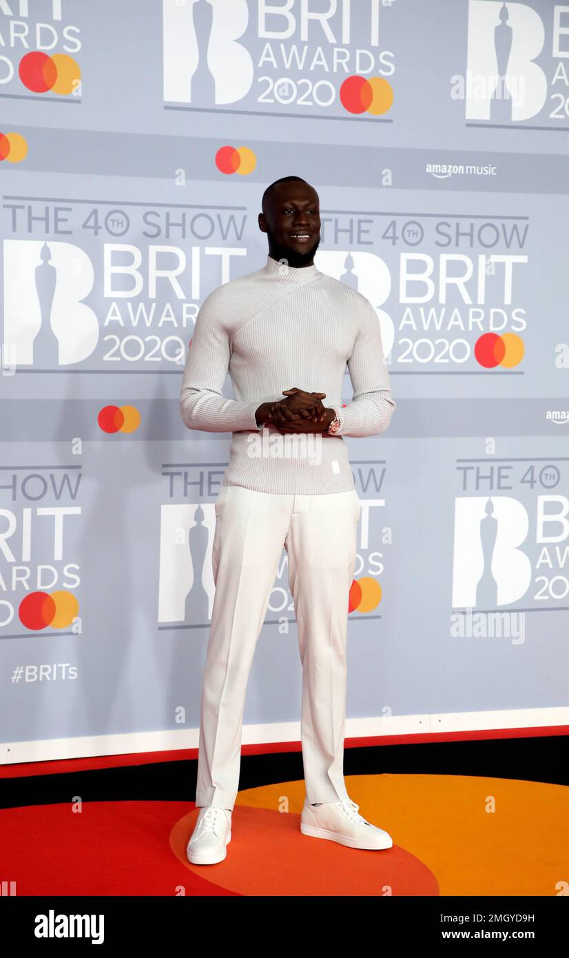 Stormzy poses for photographers upon arrival at Brit Awards 2020 in ...