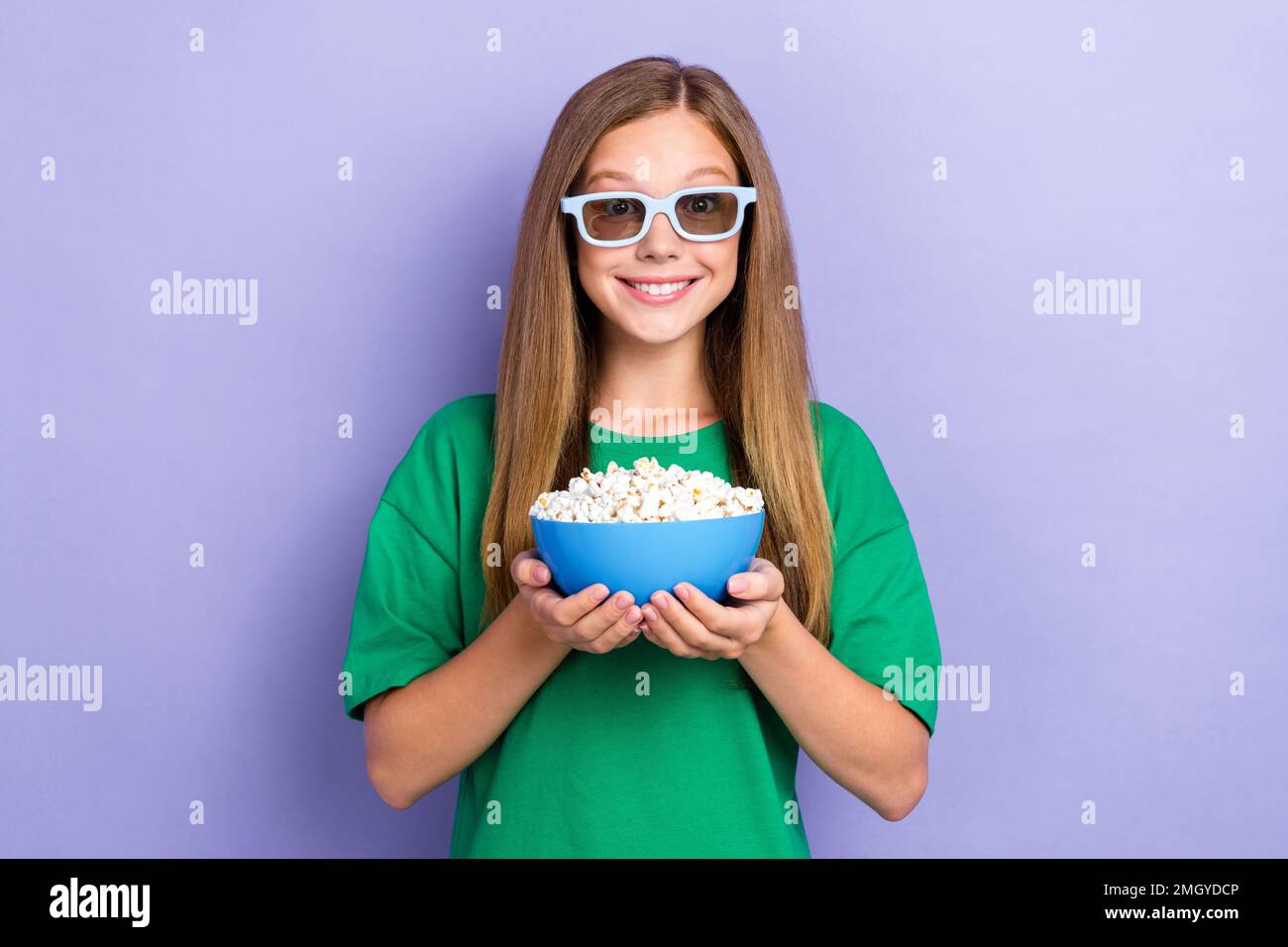 Photo of cheerful pretty lovely lady hold bucket delicious snack watch ...