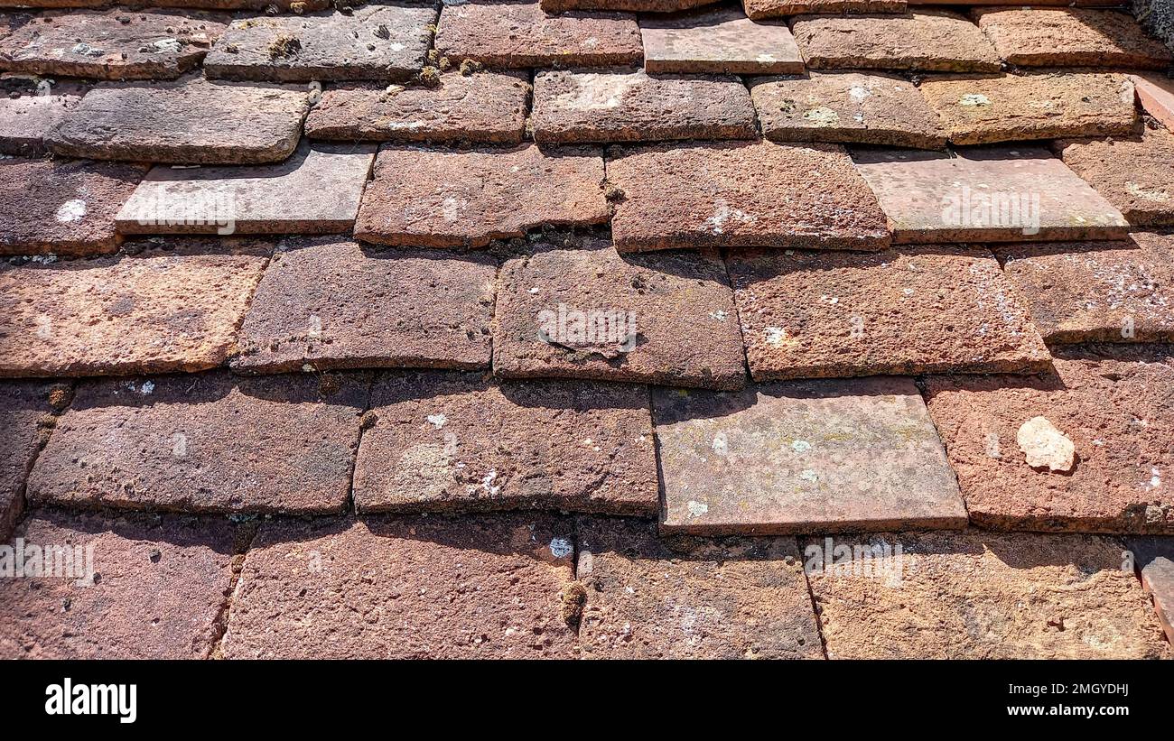 tiled ancient medieval roof background with old vintage design tiles ...