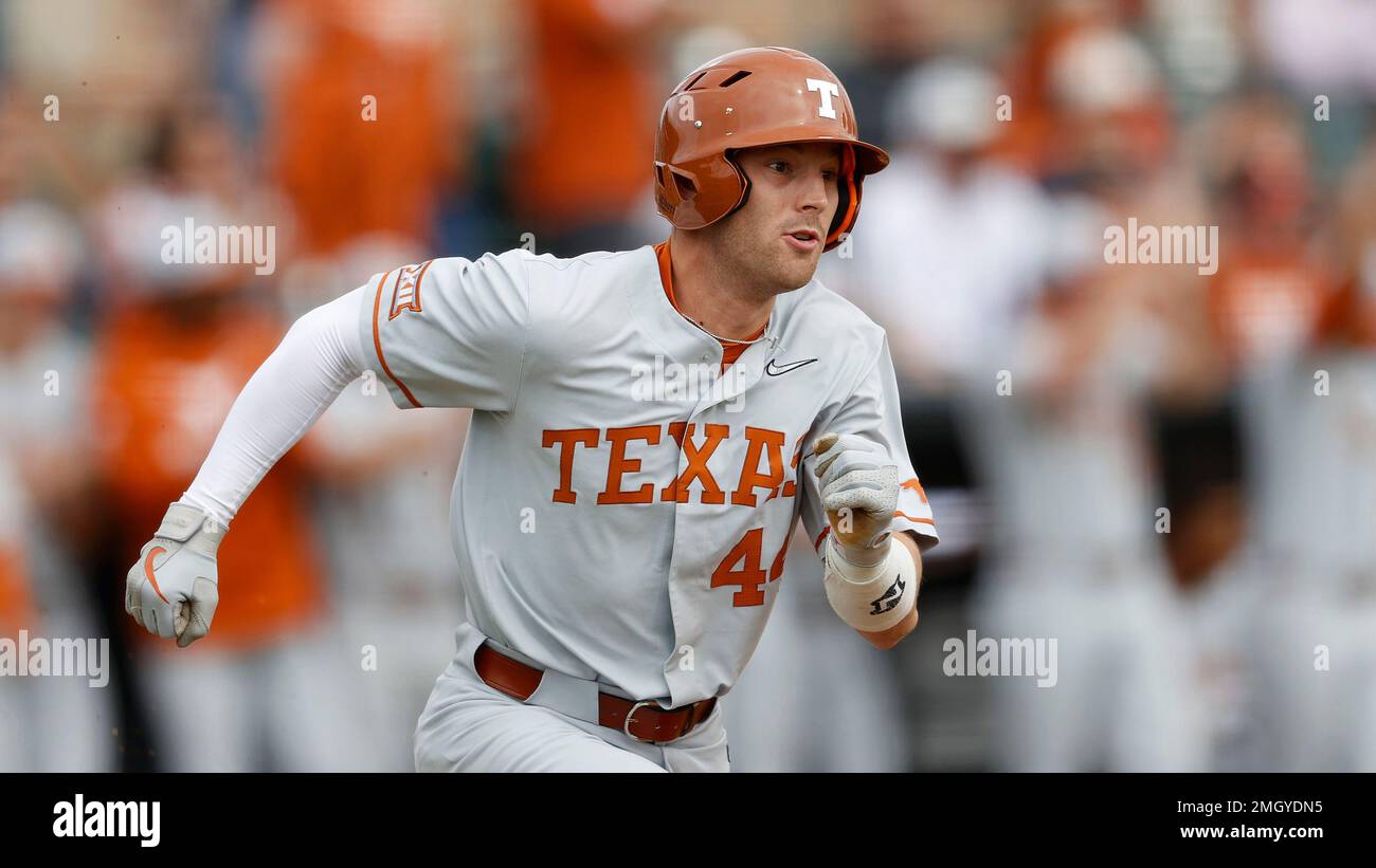 Texas's Austin Todd (44) runs down the first base line during an ...