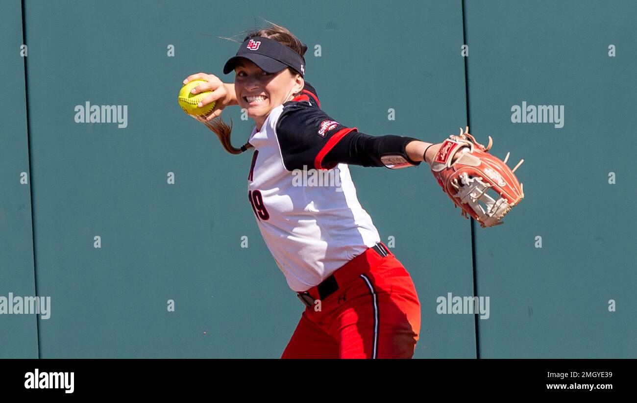 Lamar's Shannon Klaus (19) throws a ball into the infield after a Texas ...