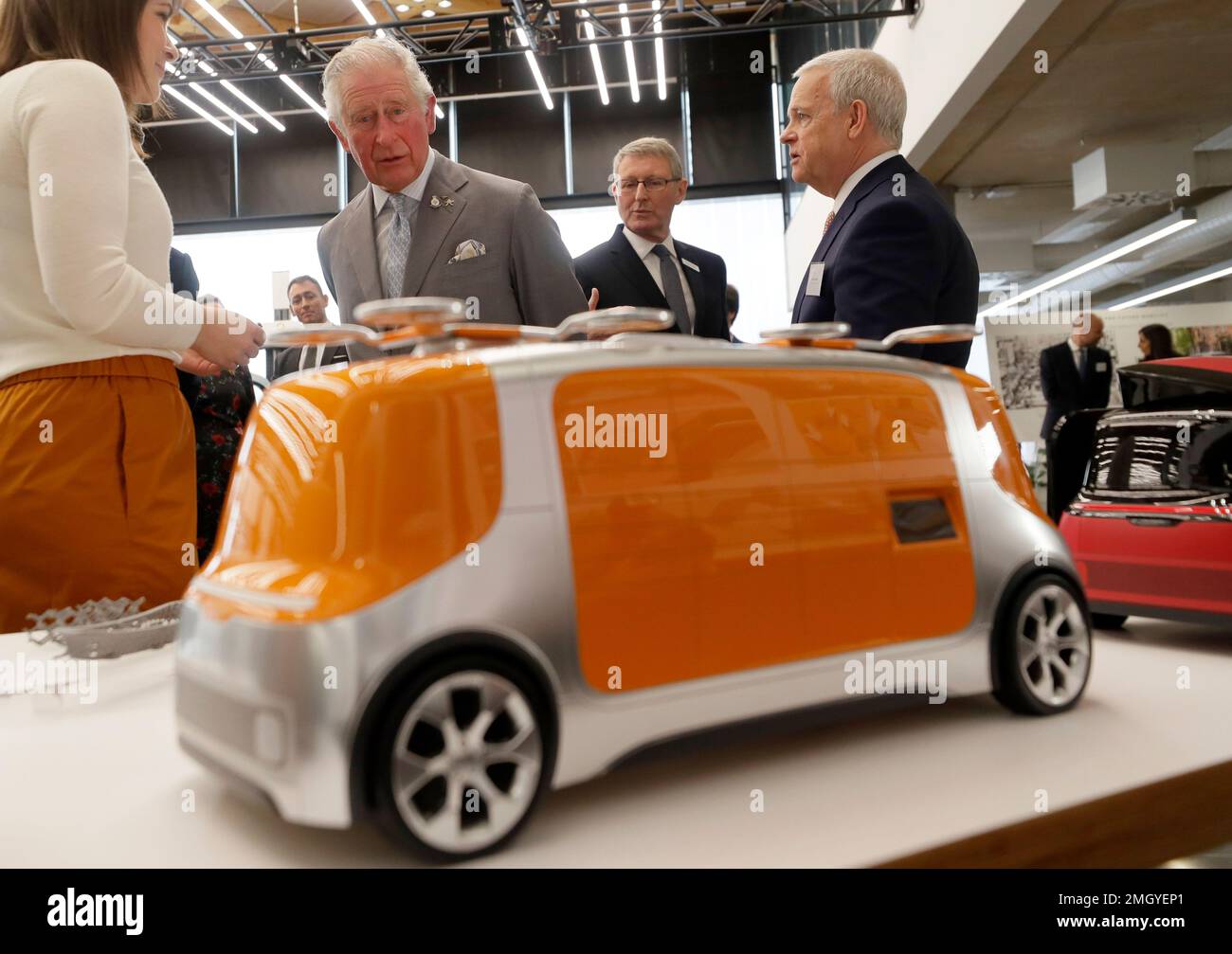 Britain's Prince Charles looks at models of 'Project Vector' during a ...