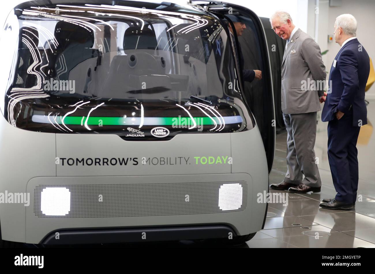 Britain's Prince Charles looks at an autonomous vehicle during a visit ...