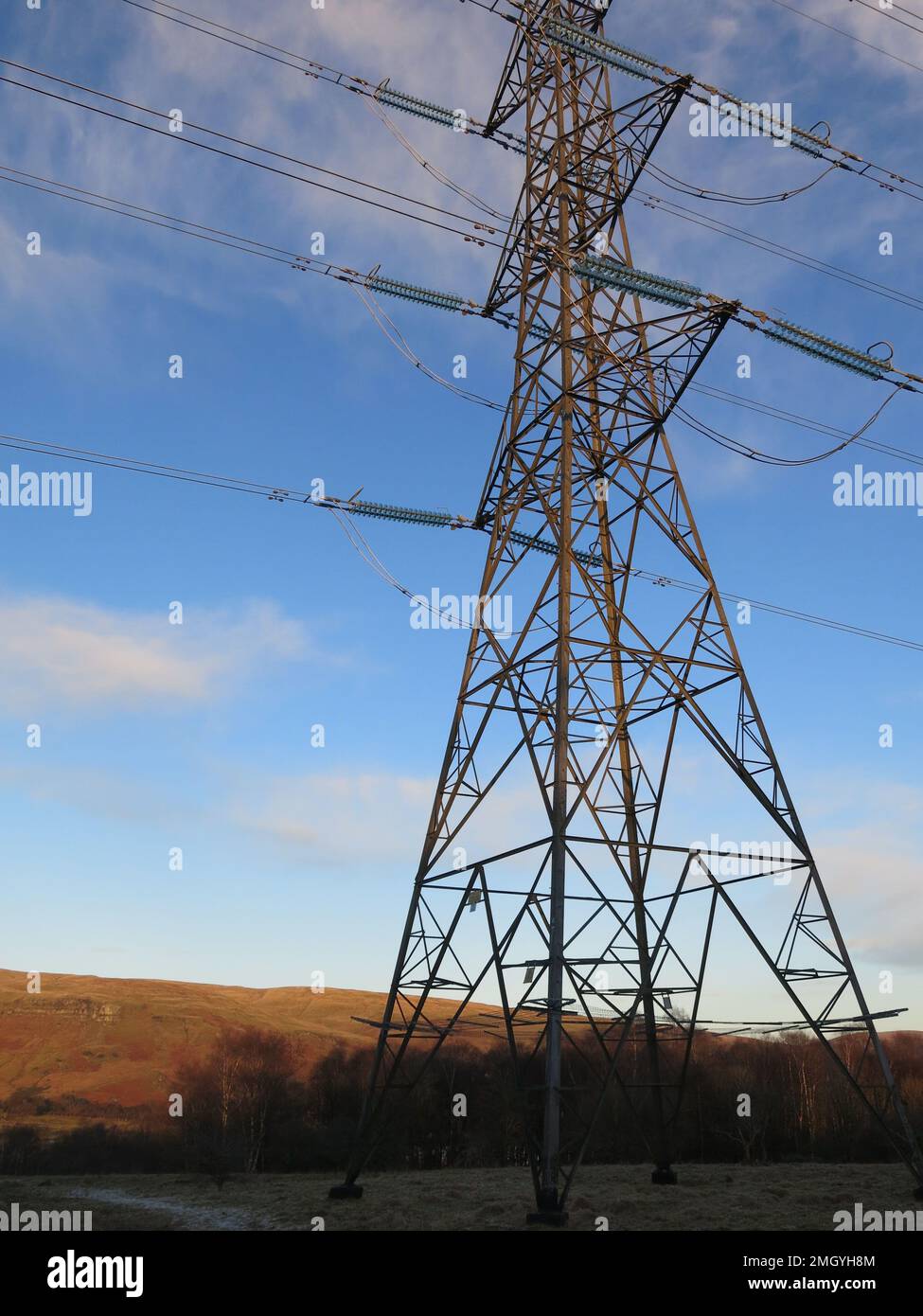 Tall electricity pylon or transmission tower, part of the energy ...