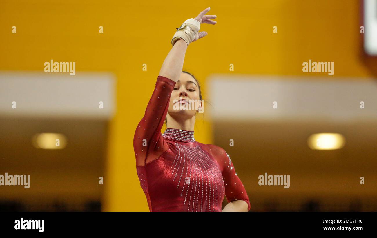Minnesota's Ona Loper does beam against Nebraska during an NCAA ...