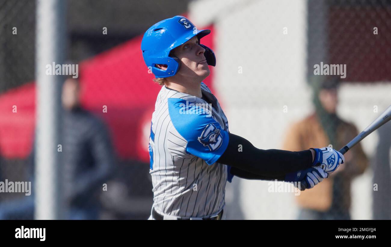 Creighton's Jason Allbery takes a swing during an at-bat in an NCAA ...