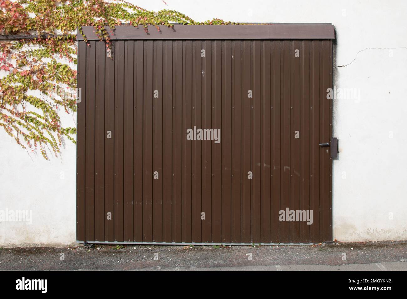 metallic brown garage door shutter curtain of facade closed car gate ...