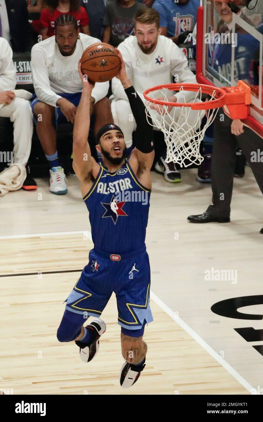 Jayson Tatum of the Boston Celtics dunks during the first half of the ...
