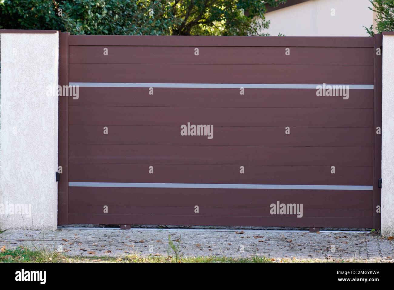 portal brown bordeaux metal of driveway entrance gates set in modern ...