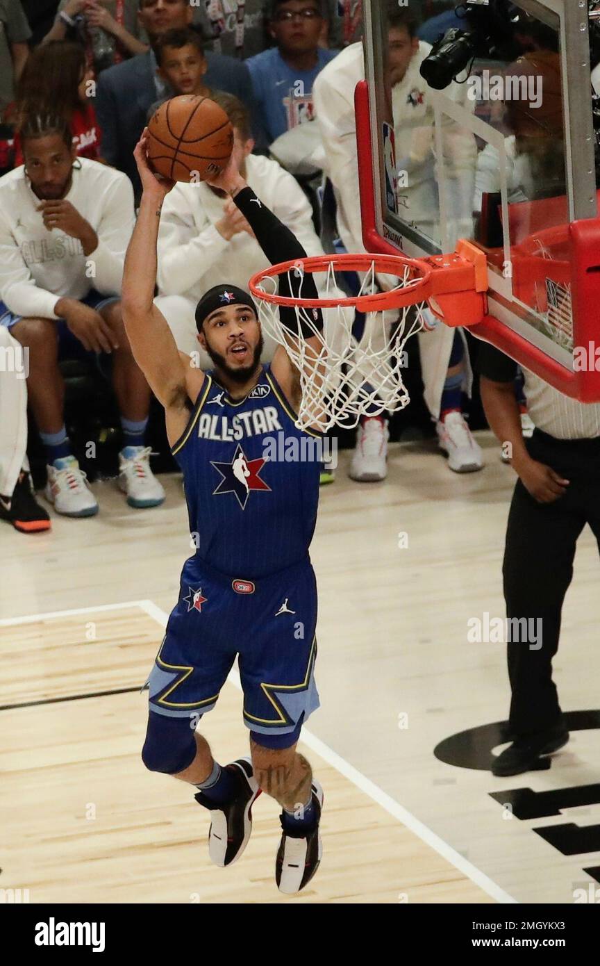 Jayson Tatum of the Boston Celtics dunks during the first half of the ...