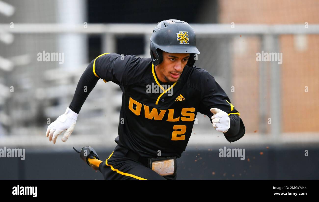 Kennesaw State player Tyler Simon runs to first base during an NCAA ...