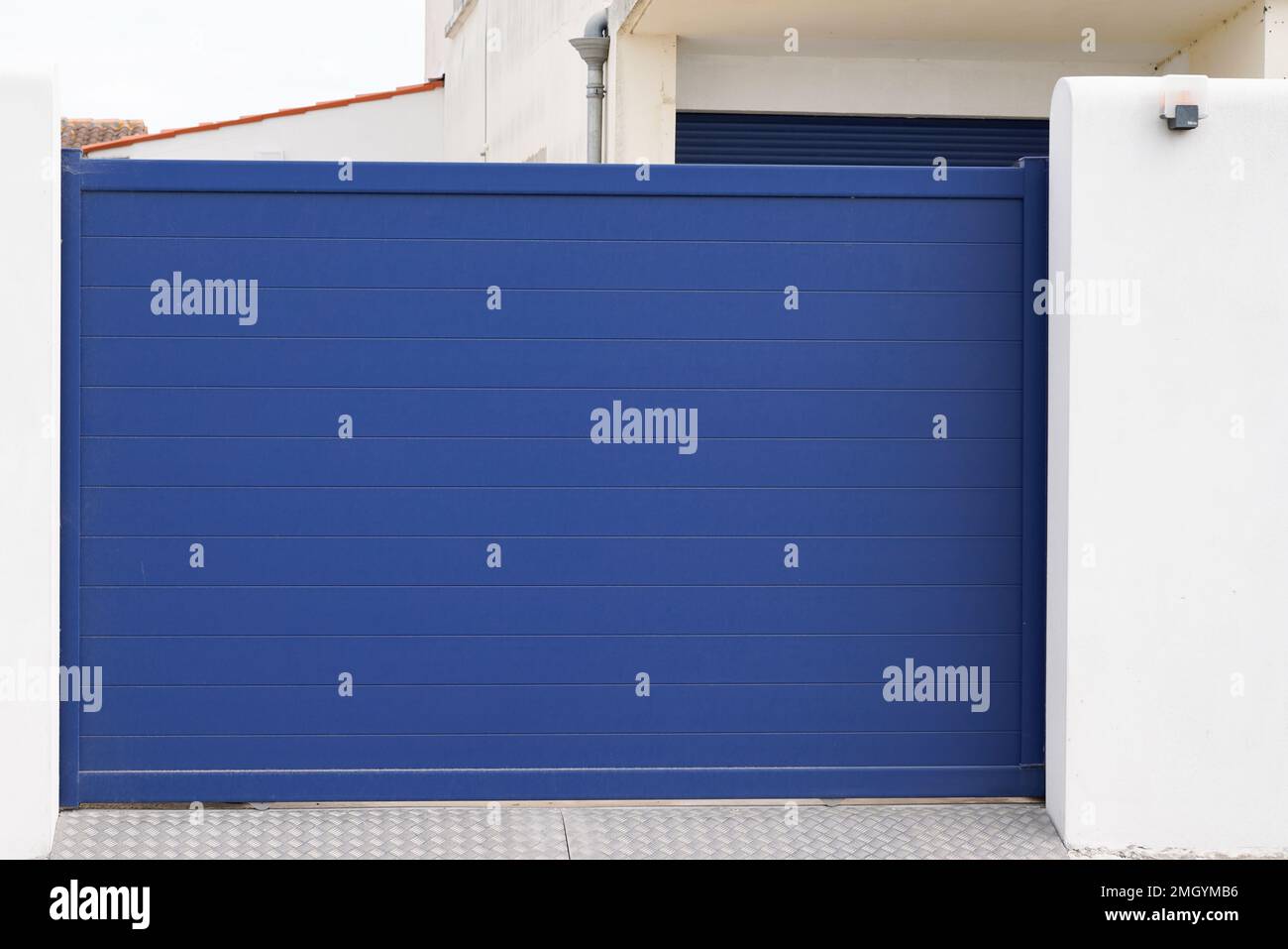 sliding portal large metal gate high grey fence on suburb street house ...